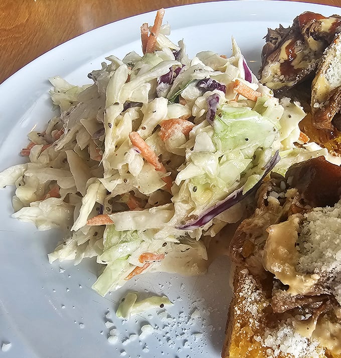 Coleslaw that knows its role – bringing fresh, crunchy contrast to smoky meats without trying to steal the spotlight.