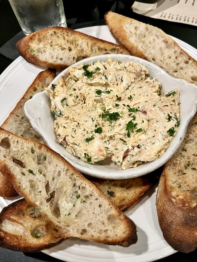 The salmon dip surrounded by crusty bread isn't just an appetizer—it's the beginning of a beautiful friendship between your taste buds and Lake Wissota.