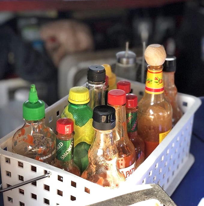 A condiment collection that means business. Hot sauce enthusiasts, rejoice – your flavor enhancers await their moment of glory.