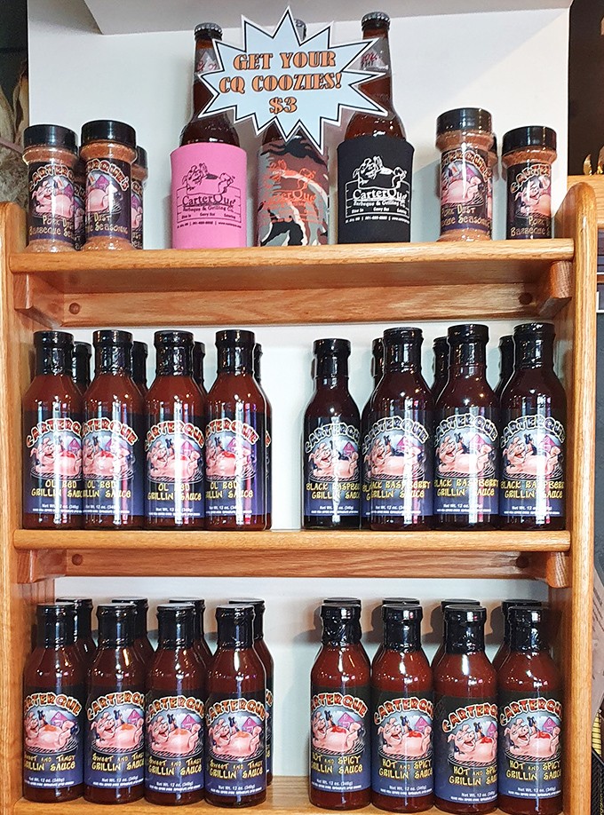 The sauce arsenal—bottled magic ready for deployment. Like choosing a wand at Ollivander's, but for your brisket instead of wizardry.