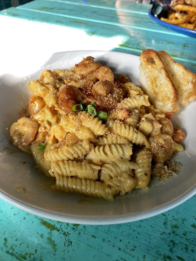 Seafood mac and cheese that elevates comfort food to an art form—creamy, indulgent, and topped with fresh crabmeat.