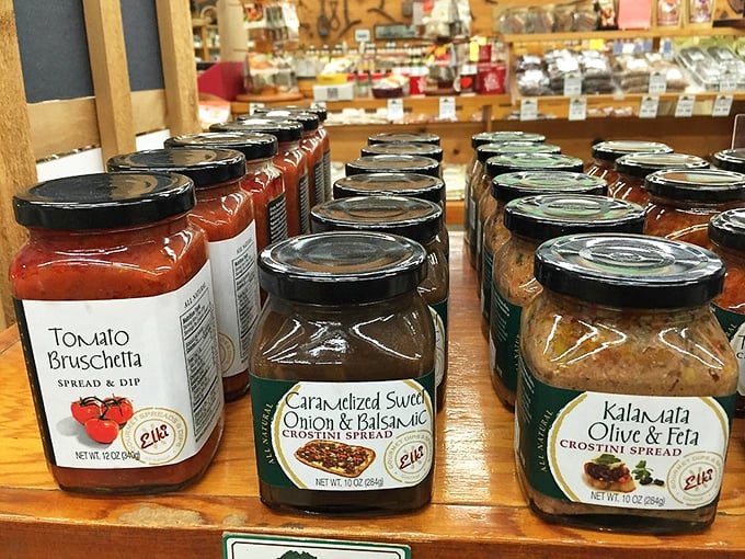Gourmet spreads promise to transform ordinary crackers into extraordinary appetizers – jars of culinary potential lined up like soldiers.