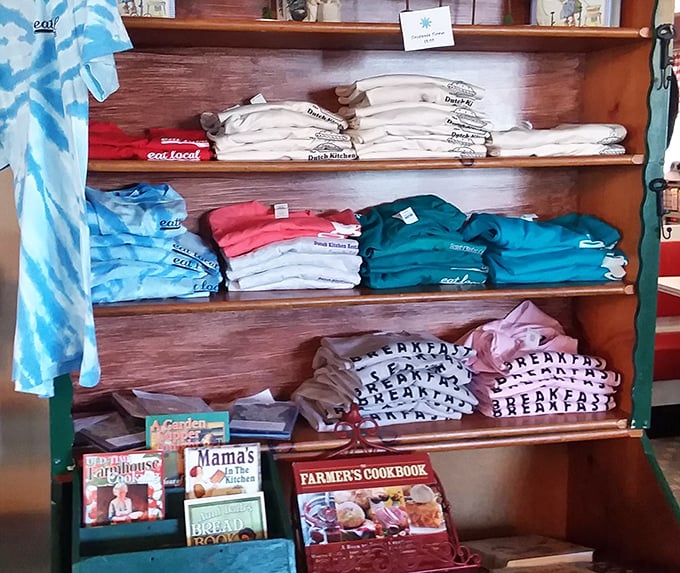 The merch corner offers cookbooks and t-shirts for those who want to take home more than just leftovers and happy memories.