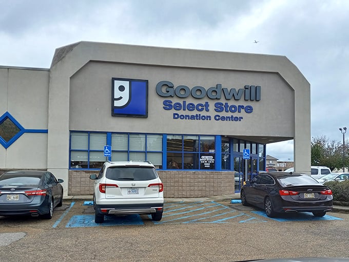 Another view of the storefront with its distinctive blue accents. The accessible parking ensures everyone can join the treasure hunt.
