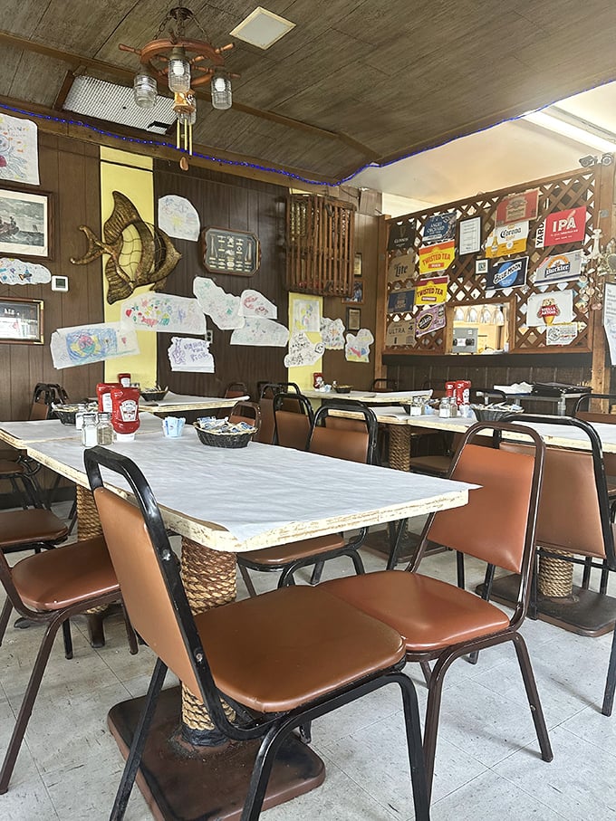 The dining room feels like your seafood-loving uncle's basement rec room—if that basement happened to serve the best crab in Pennsylvania.
