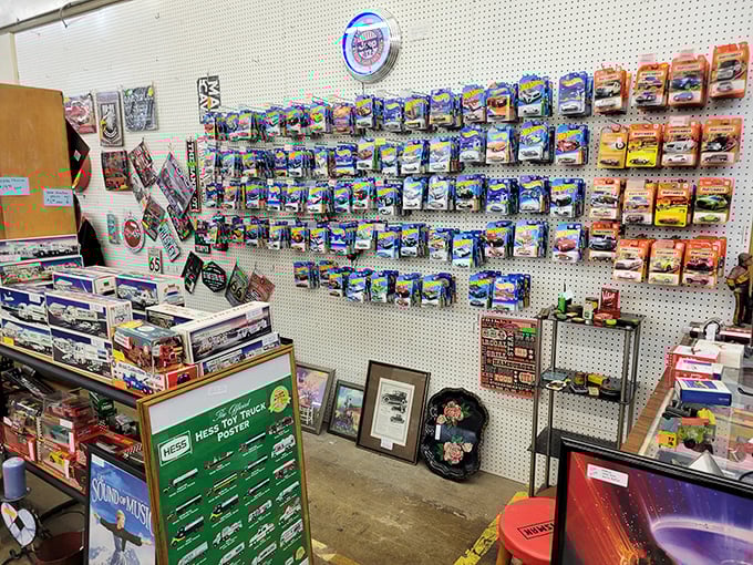 A wall of miniature trucks that proves collecting isn't just a hobby—it's a highly organized obsession with tiny wheels.