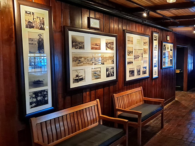 The waiting area's maritime history gallery doubles as a time machine. These weathered photos tell stories of Cape May's fishing heritage while you anticipate your feast.