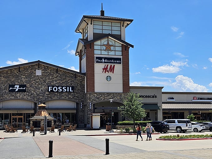Two-story shopping bliss rises from Texas soil, where escalators carry dreams and deals to new heights.