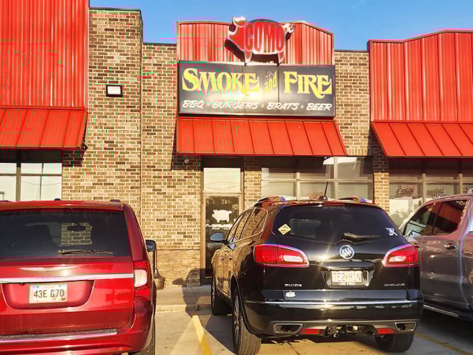 Como Smoke and Fire's bold red roof signals barbecue confidence—they know what they're doing and aren't afraid to show it.