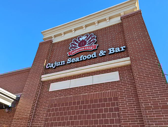 Dancing Crab's brick exterior hints at the lively seafood party waiting inside, where bibs are required and fun is guaranteed.
