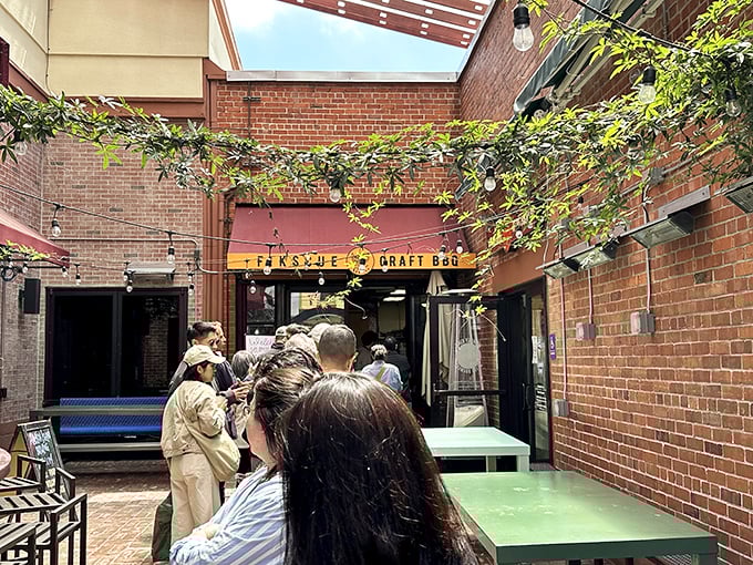 Fikscue's brick-lined entrance feels like the gateway to a secret barbecue society—and you've just been initiated.