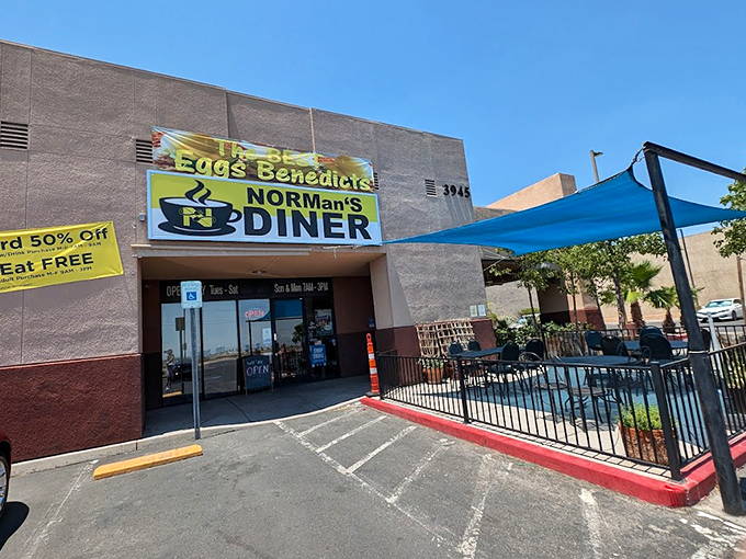 That blue awning provides shade while you contemplate whether to order seconds of everything delicious.