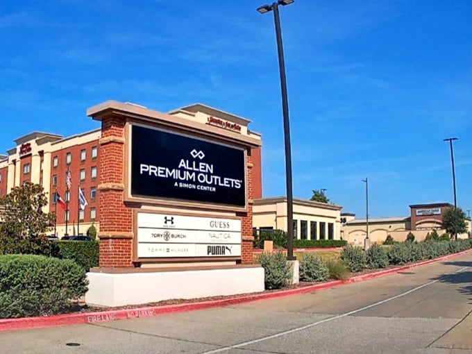 Brick and mortar elegance houses modern retail magic, proving outlet malls can look as good as they save.