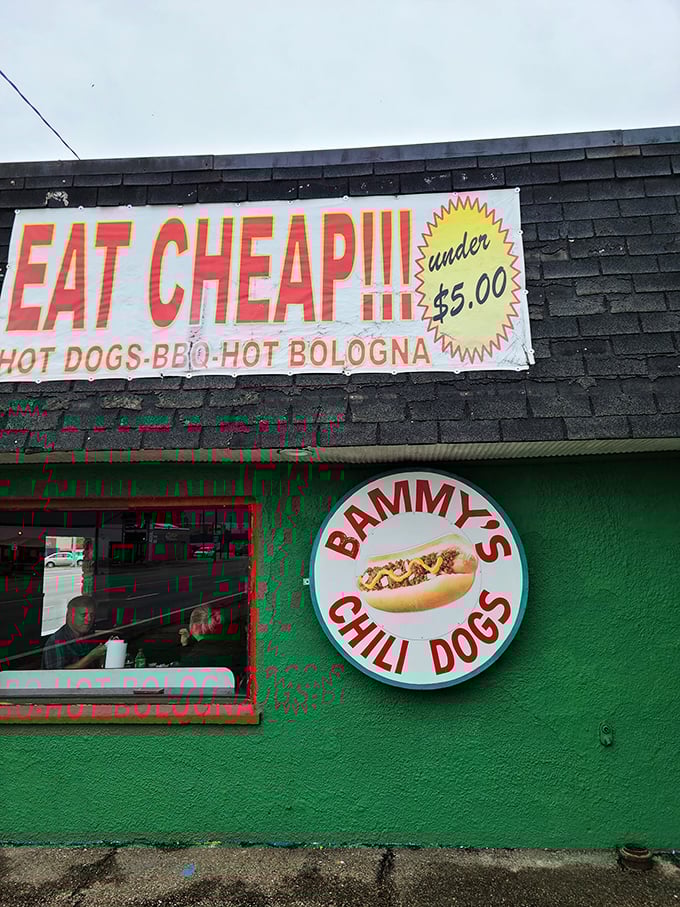 The vibrant green exterior with that circular logo is like a beacon of hope for hungry travelers on a budget.