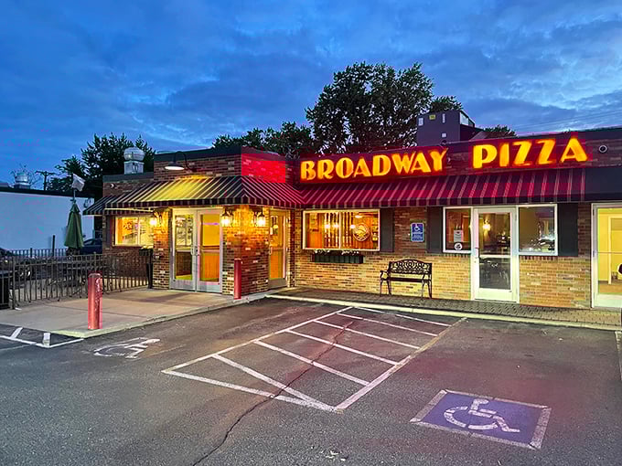 When the neon sign glows against the twilight sky, it's not just advertising – it's a love letter to pizza traditions worth preserving.