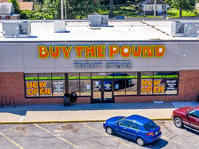 The "NOW OPEN" signs at Buy The Pound welcome you to Missouri's most unique thrifting experience—where everything's sold by weight!
