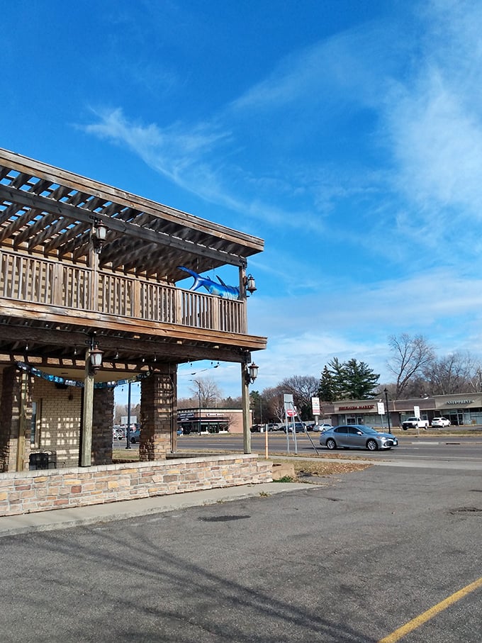 The weathered wood exterior hints at the treasures within—seafood boils that transport you straight to the shore.