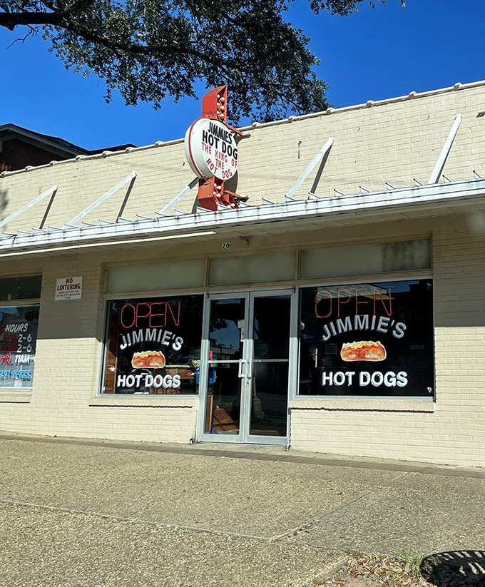 White brick and vintage signage create the perfect time capsule where great hot dogs never go out of style.