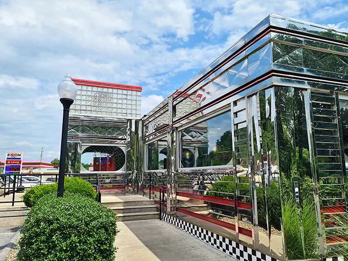That red metal roof crowns Manheim Diner like a cherry on top of a sundae—a splash of color against the silver that says "good food happens here."