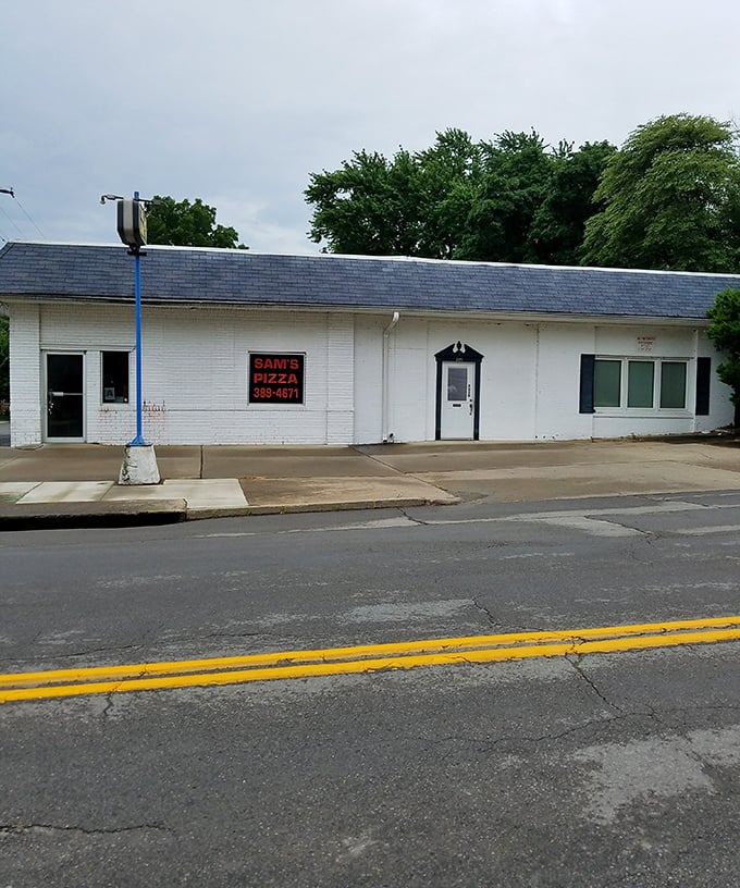 Sam’s Pizza keeps things simple — no frills, no fuss, just carbs, cheese, and small-town charm.