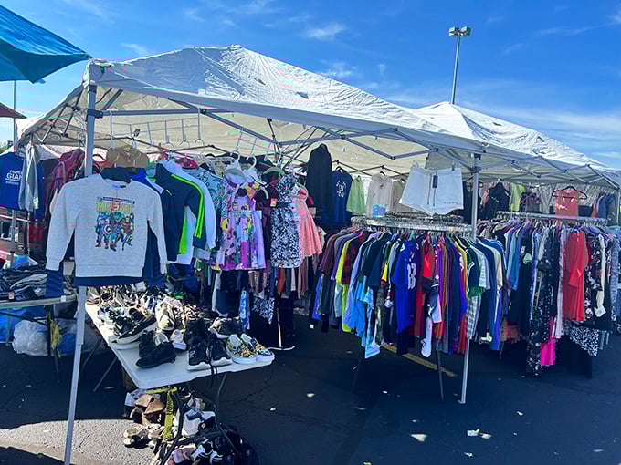 Rows of colorful clothing dance in the breeze, creating a rainbow of possibilities under stadium lights.