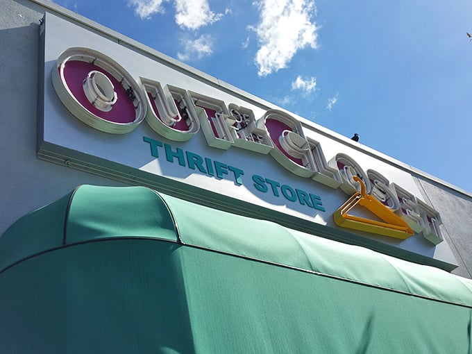 Same sign, different angle—still promising the thrill of the hunt. Those purple letters practically wink at passing bargain hunters!