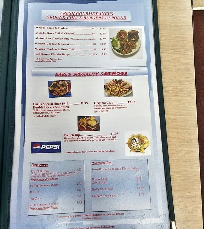 The menu reads like a love letter to American comfort food—half-pound burgers and specialty sandwiches that have stood the test of time.