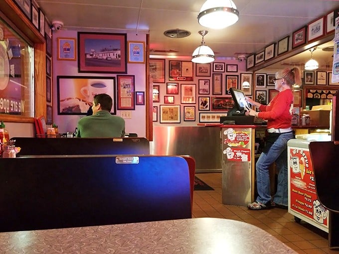 Step inside and you're transported to a simpler time—walls adorned with memories, booths that have witnessed countless conversations, and a counter that feels like home.