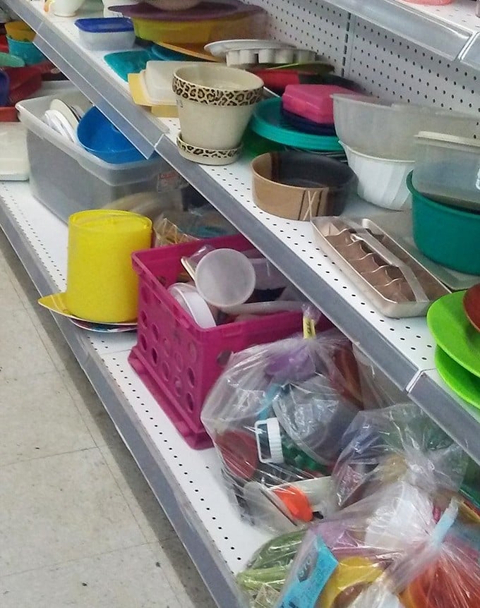Tupperware heaven or kitchen gadget purgatory? Either way, that leopard-print flower pot is calling your name from the second shelf.